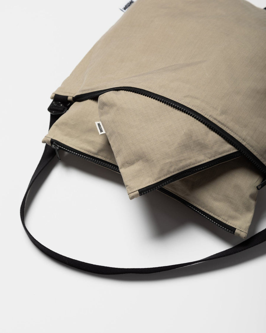Water Resistant Messenger Bag - Stone – WAWWA Ф